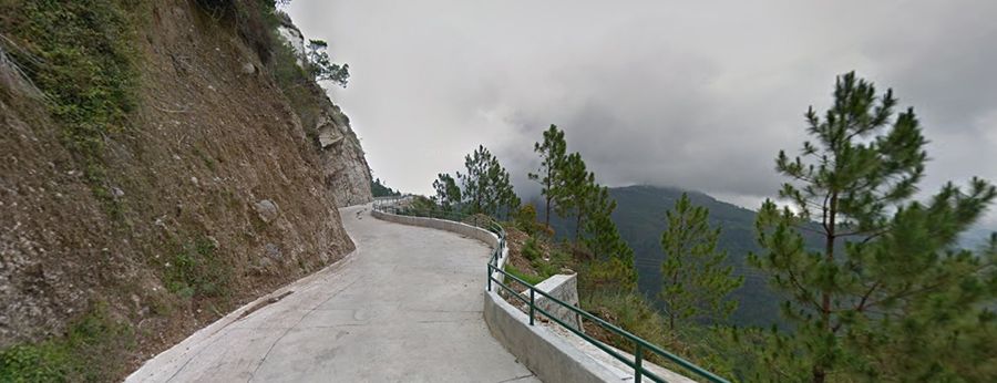 A narrow and rough road to Mount Santo Tomas